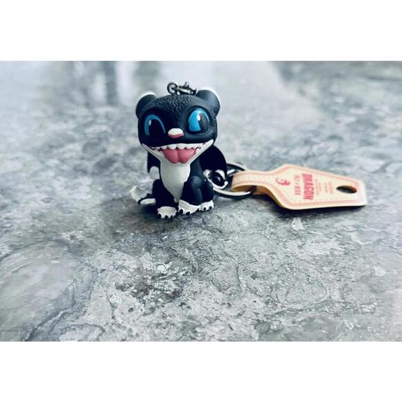 Other | How To Train Your Dragon Baby Dart Keychainhttyd Epic Universe ...